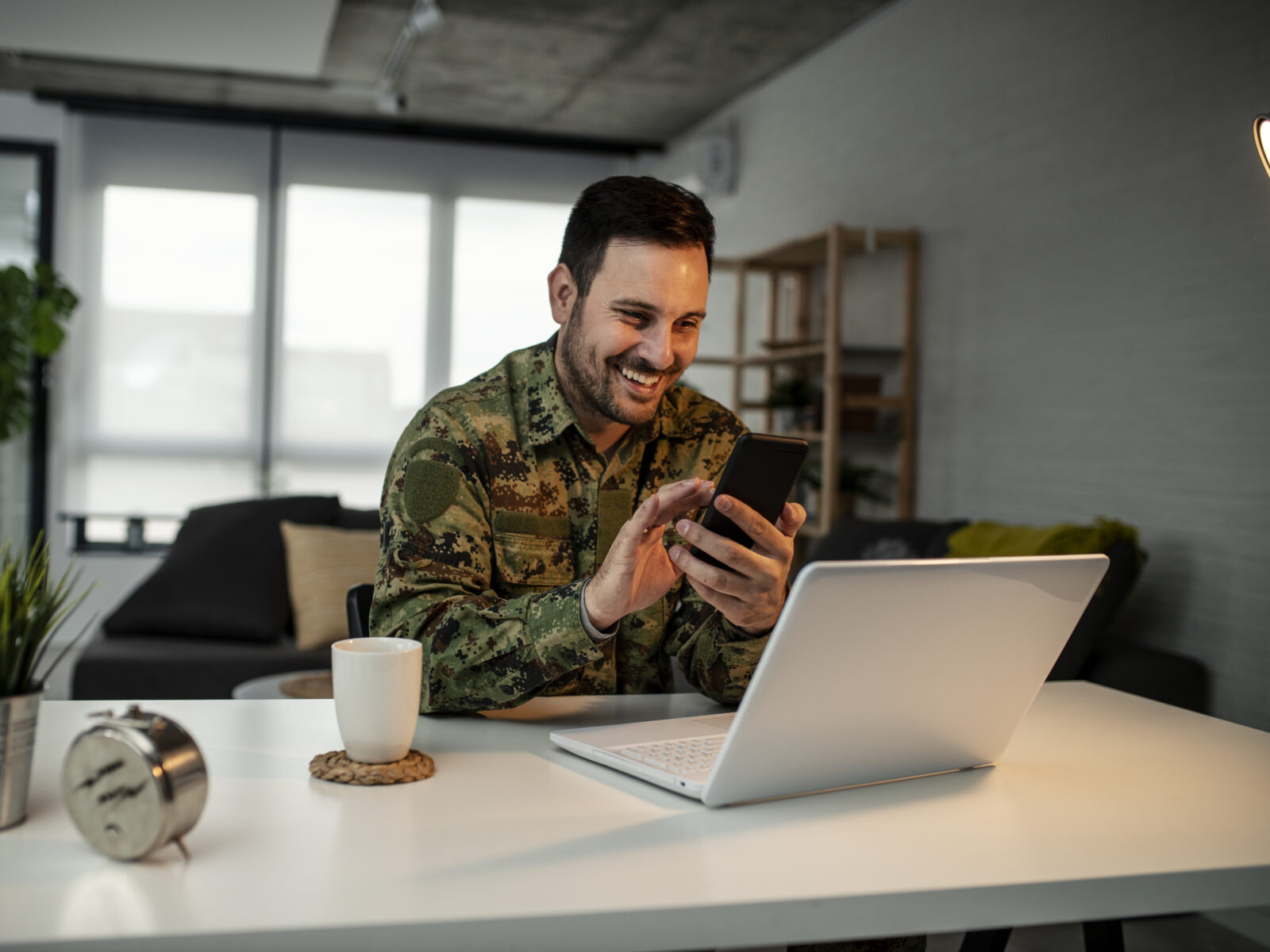 Army man with smart phone | HeroCare Connect